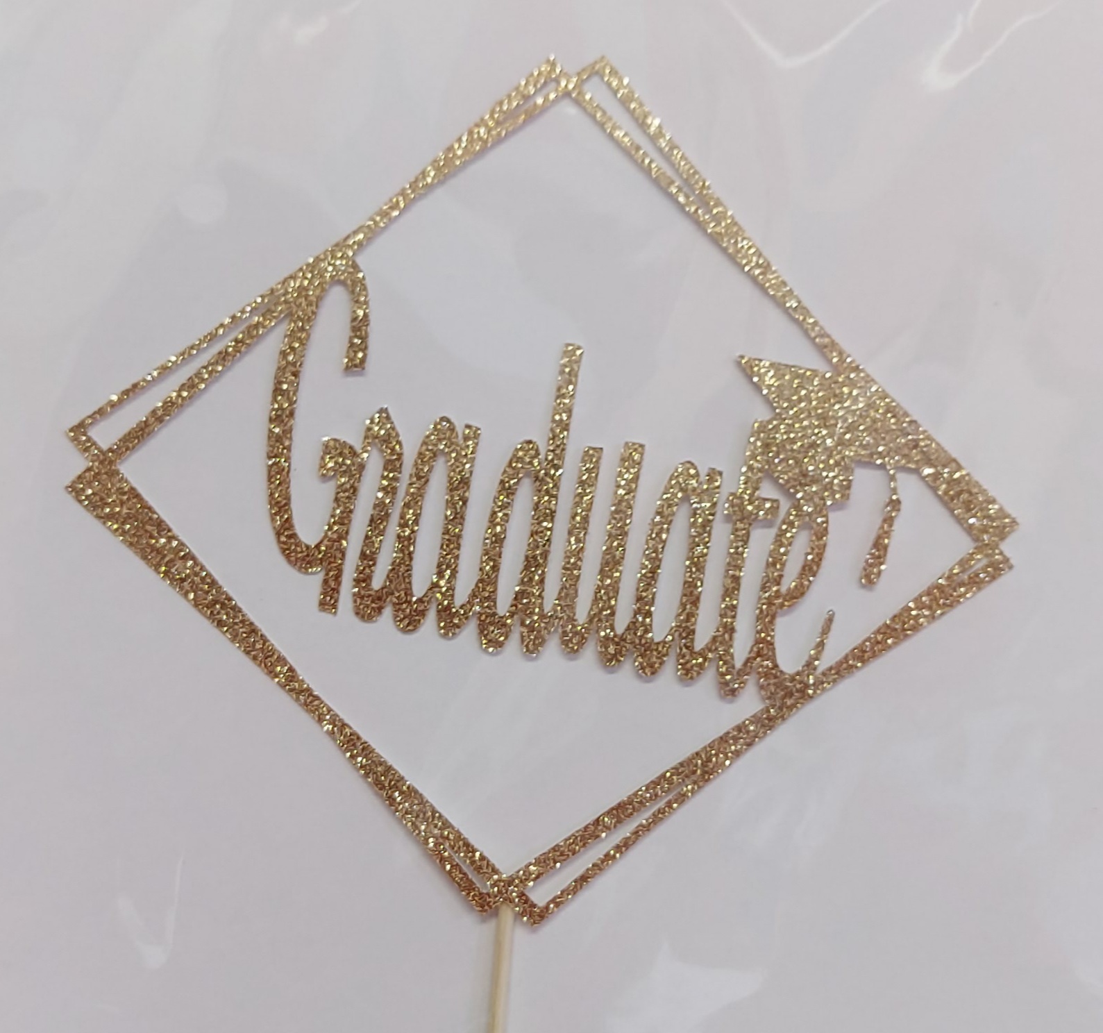 BUY BAKING AND CAKE DECORATIONS ONLINE. GOLD GRADUATE CAKE TOPPER